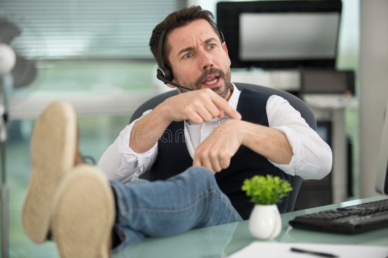 Male Bosse Pointing at Watch Stock Image - Image of scared, handsome ...