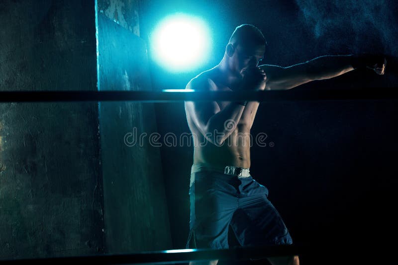 Male Boxer Boxing in a Dark Studio Stock Image - Image of exercise ...
