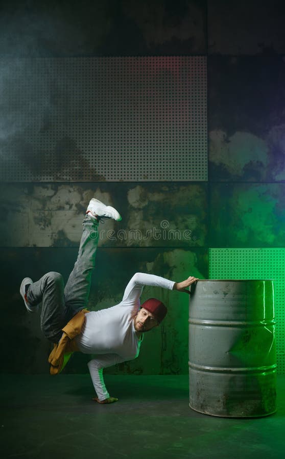 Male Break Dancer Performing on Loft Stage in Green Neon Light Stock ...