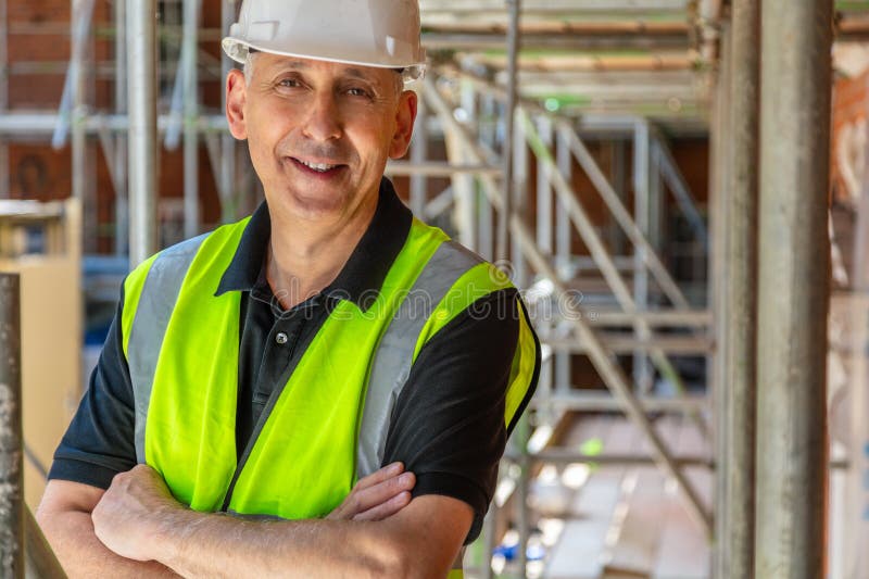 Male Builder Construction Worker Contractor on Building Site Arms ...