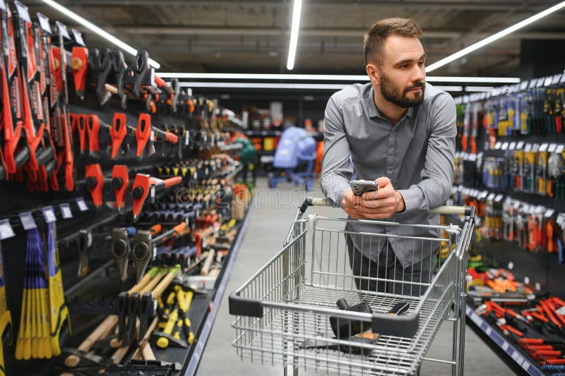 Male Builder in a Hardware Store Stock Image - Image of hand, adult ...