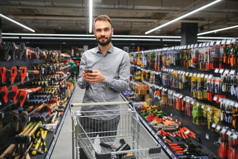 Male Builder in a Hardware Store Stock Image - Image of shopping ...