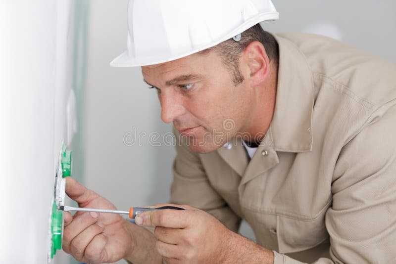 Male Builder during Installation Electrical Sockets Stock Photo - Image ...
