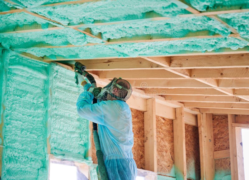 Worker Spraying Polyurethane Foam for Insulating Wooden Frame House ...