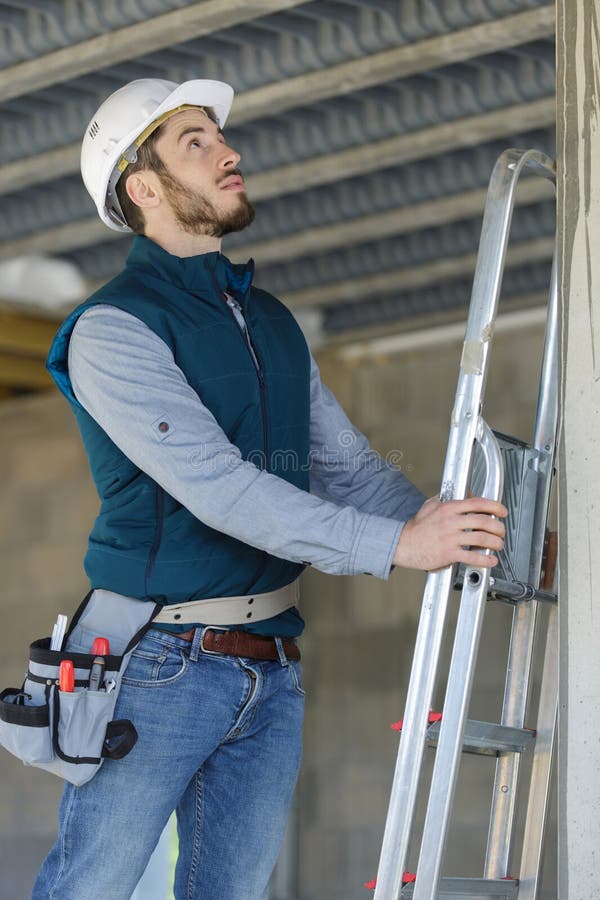 Male builder on ladder stock image. Image of flat, room - 326320719
