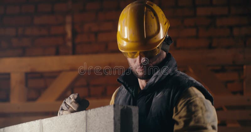 Male Builder Measuring Brick Wall Stock Video - Video of work ...