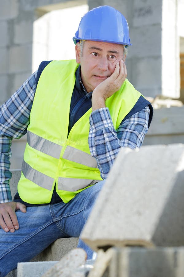 Male Builder Next To Cement Block Wall Construction Stock Image - Image ...