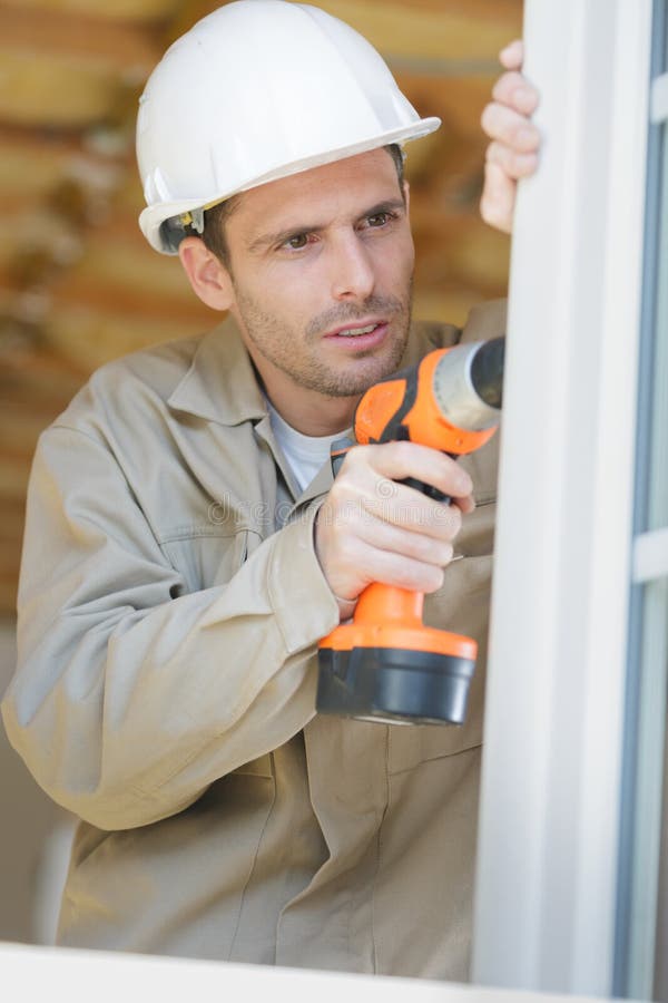 Male Builder during Process Windows Installation Stock Photo - Image of ...