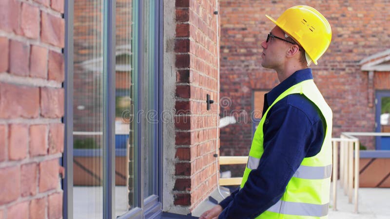 Male Builder with Ruler Measuring Window Stock Footage - Video of ...