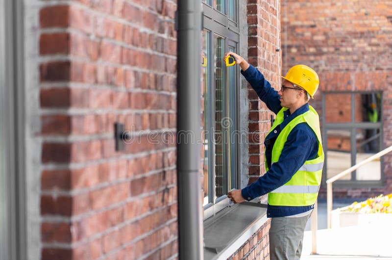 Male Builder with Ruler Measuring Window Stock Image - Image of foreman ...