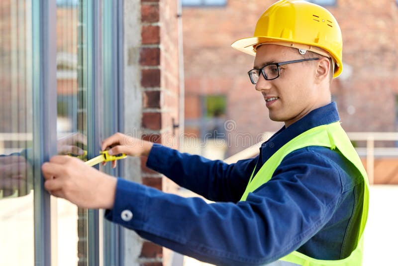 Male Builder with Ruler Measuring Window Stock Image - Image of helmet ... Male Builder with Ruler Measuring Window Stock Image - Image of helmet ...