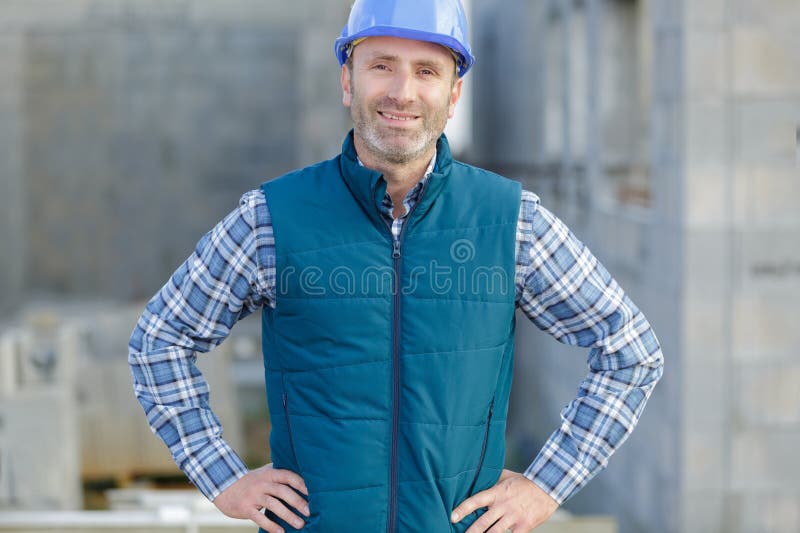 Male Builder Standing Outdoors Stock Image - Image of architecture ...