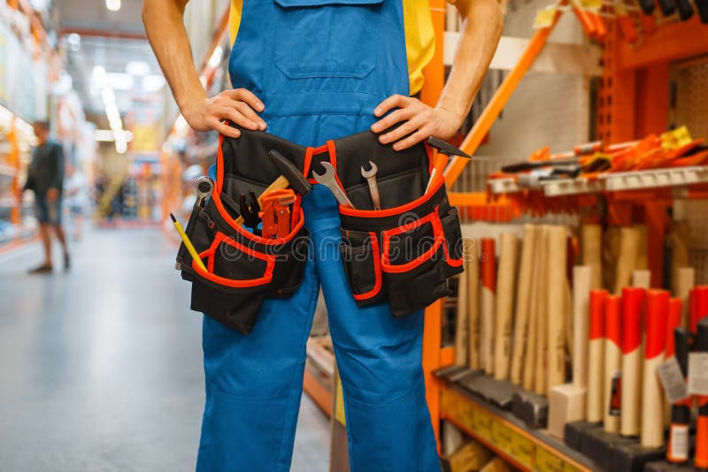 Builder Trying To Reach Something. Stock Image - Image of measure ...