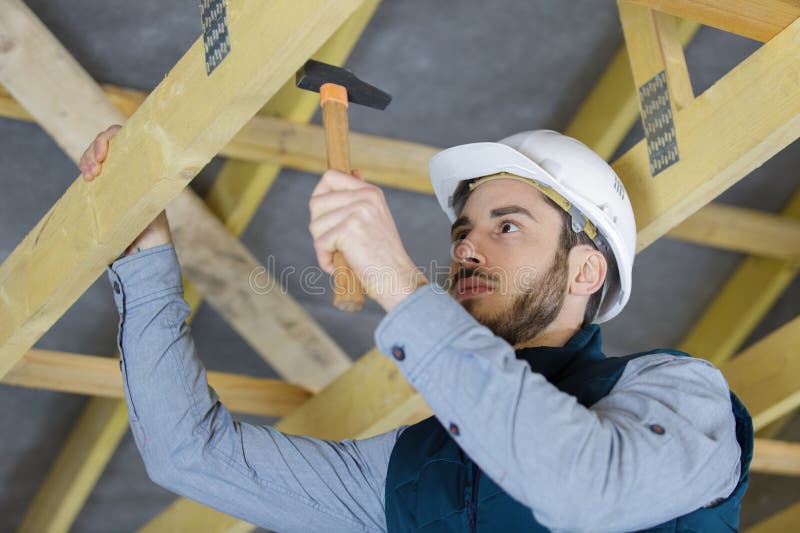 Male Builder Working on Wooden Frame House Stock Image - Image of ...