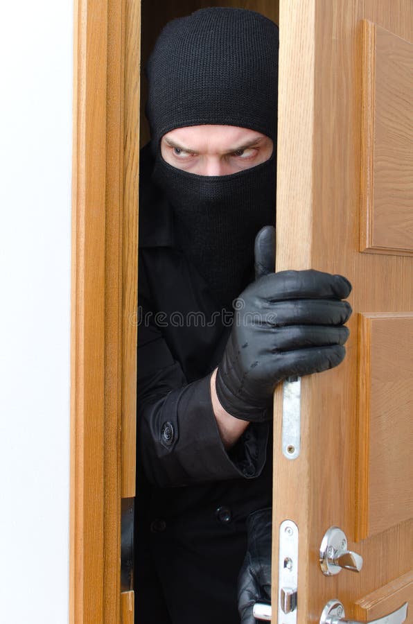 Male burglar in mask stock photo. Image of male, lock - 29235146