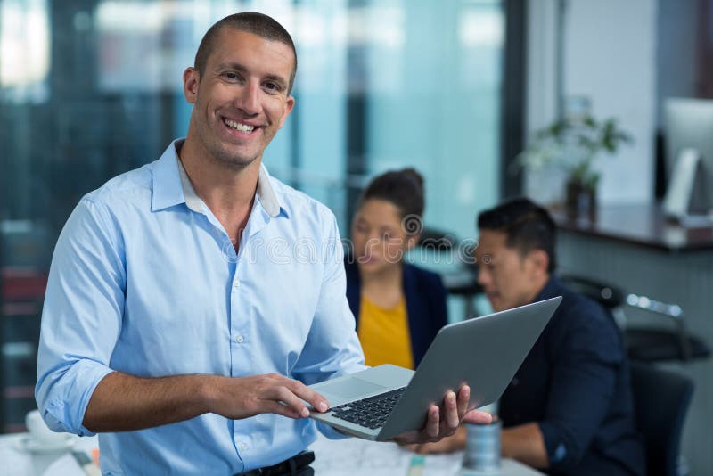 Male Business Executive Using Laptop Stock Image - Image of caucasian ...