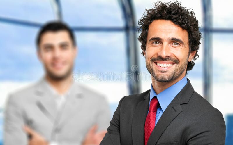 Male Business Partners in the Office Stock Image - Image of folded ...