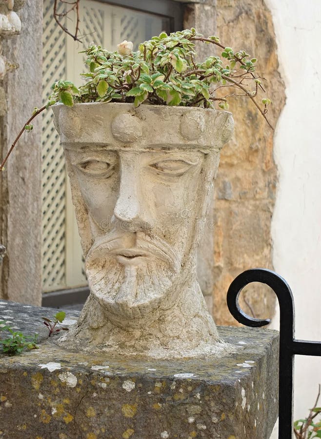 Male bust as a flower pot stock image. Image of stone - 209871111