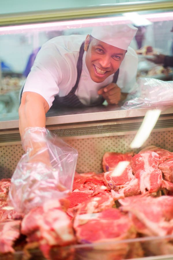 Male Butcher Helping Customer Stock Photo - Image of counter, portrait ...
