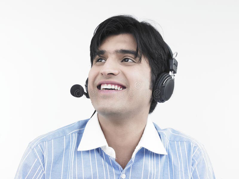 Male Call Centre Operator Doing His Job Stock Image - Image of headset ...
