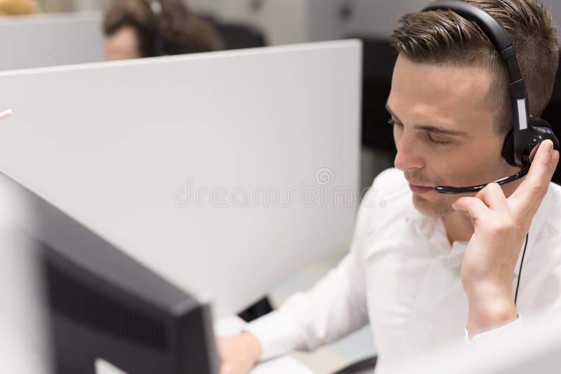 Male Call Centre Operator Doing His Job Stock Image - Image of headset ...