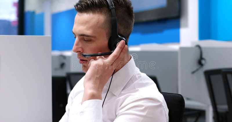 Male Call Centre Operator Doing His Job Stock Photo - Image of business ...