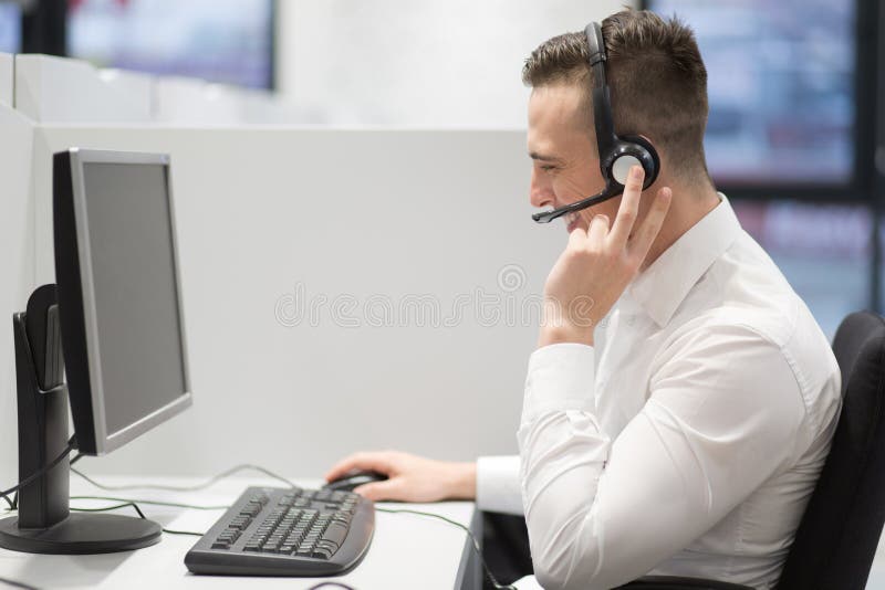 Male Call Centre Operator Doing His Job Stock Image - Image of headset ...