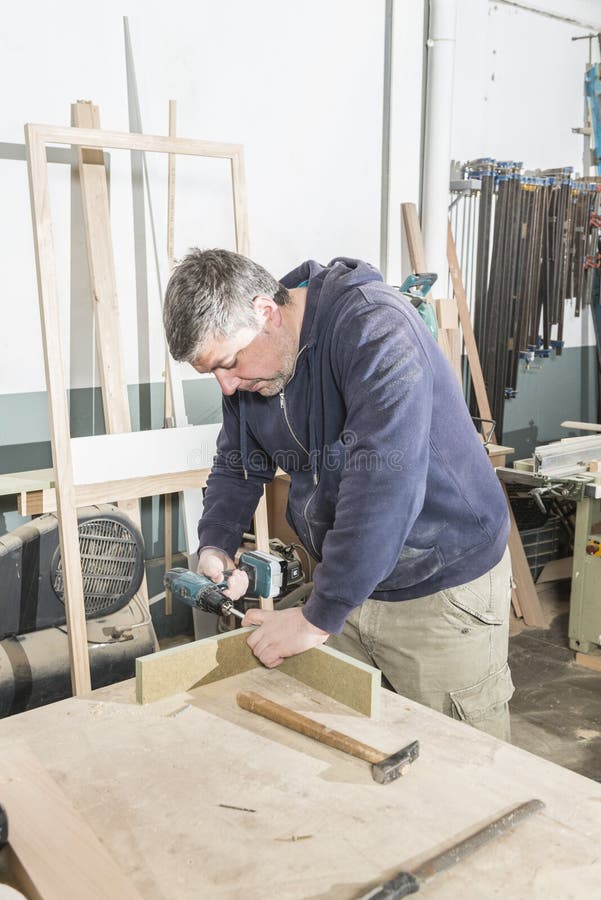 Male Carpenter Working in His Carpentry Workshop Stock Photo - Image of ...