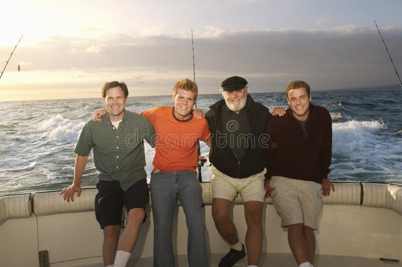 Male Caucasian Friends on Yacht Stock Photo - Image of nautical, ocean ...