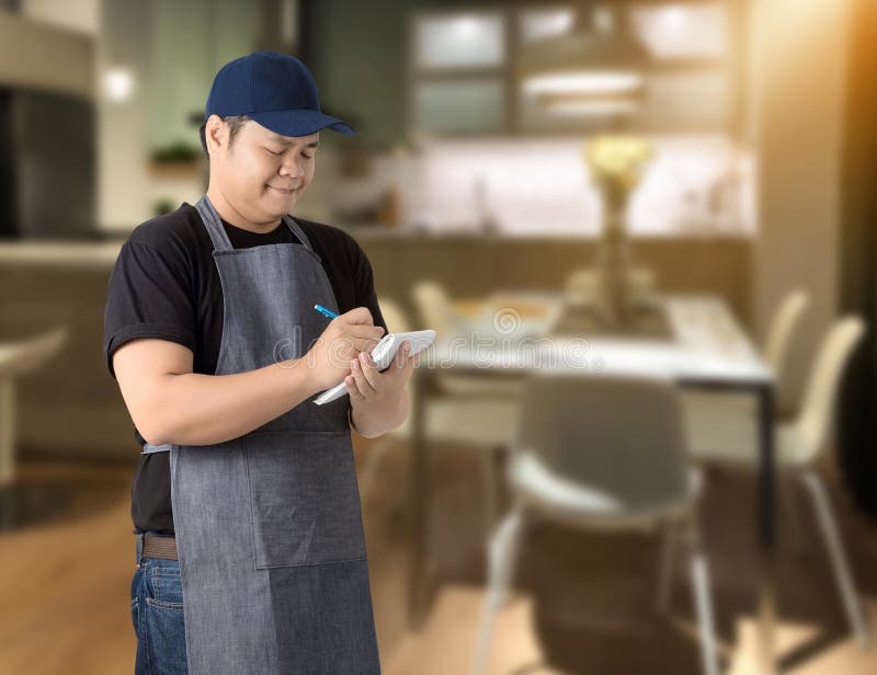 Male Chef Assistant Taking Order and Making Note Stock Image - Image of ...