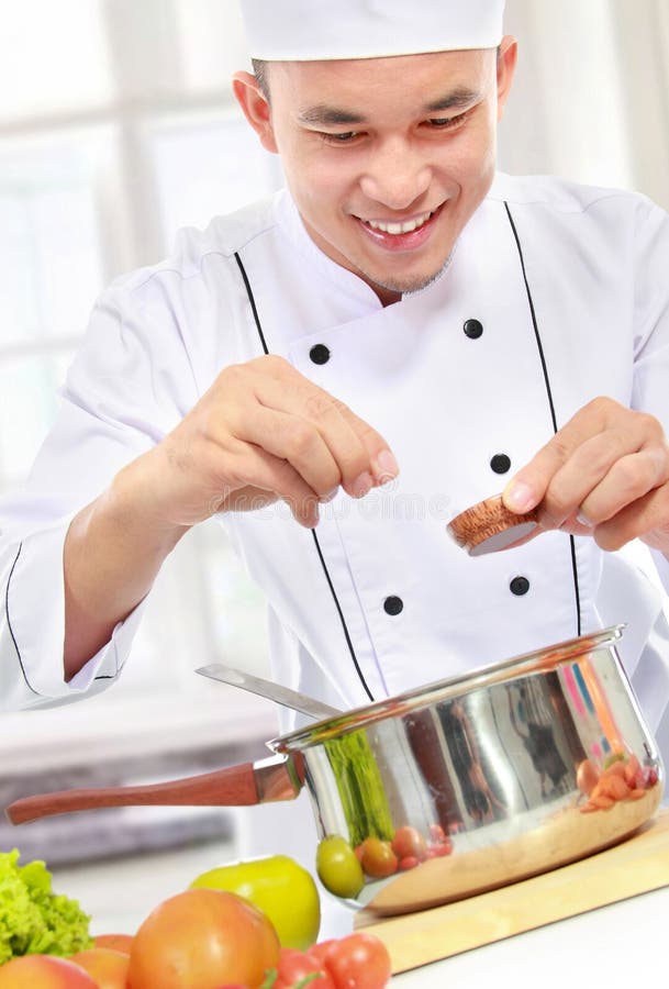 Male Chef Put Some Ingredient in the Pot Stock Image - Image of ...