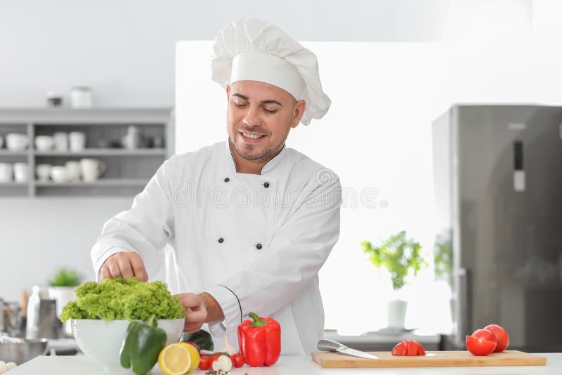 Male Chef Cooking Tasty Dish in Kitchen Stock Photo - Image of dinner ...