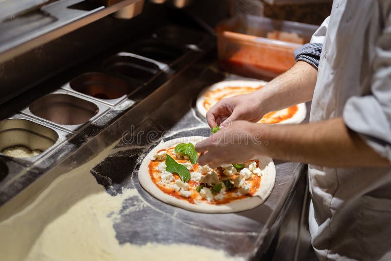 Male Chef Hands Making Pizza in the Pizzeria Kitchen Stock Image ...