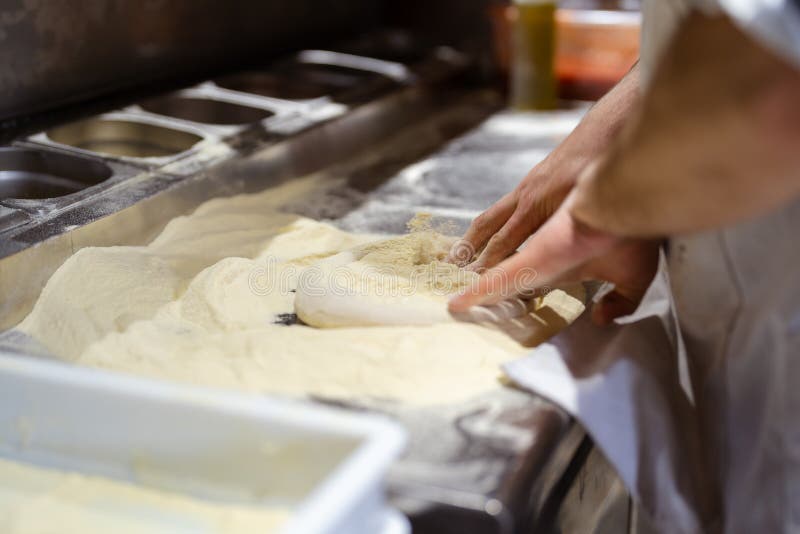 Male Chef Hands Making Pizza in the Pizzeria Kitchen Stock Photo ...