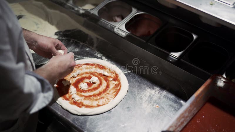Male Chef Hands Making Pizza in the Pizzeria Kitchen Stock Video ...