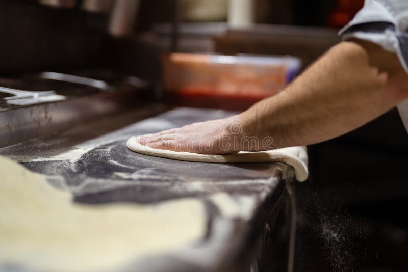 Male Chef Hands Making Pizza in the Pizzeria Kitchen Stock Image ...