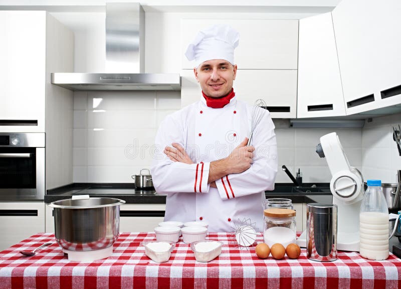 Male chef at kitchen stock image. Image of uniform, kitchen - 34290785