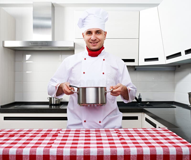 Male chef at kitchen stock image. Image of male, person - 35004831