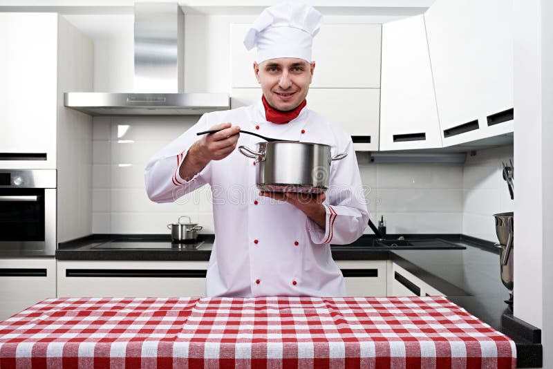 Male chef at kitchen stock photo. Image of people, profession - 34290750