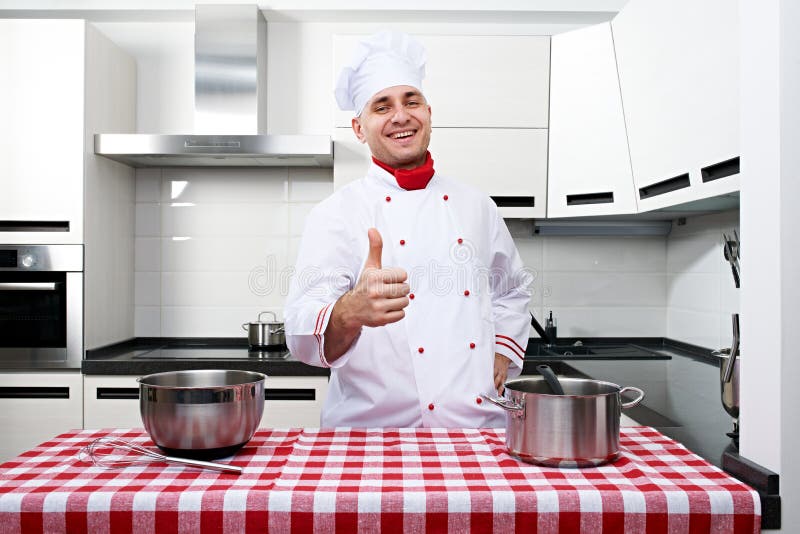Male chef at kitchen stock image. Image of gourmet, uniform - 34290767