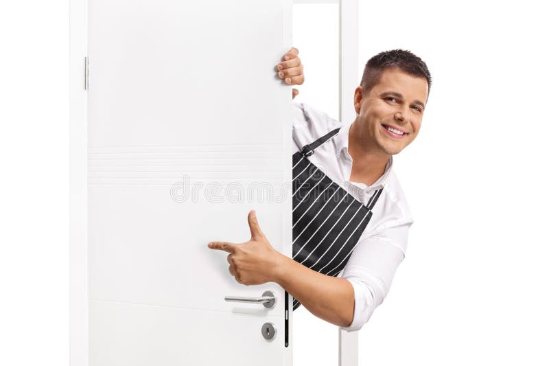 Male chef opening a door stock image. Image of room - 339166653