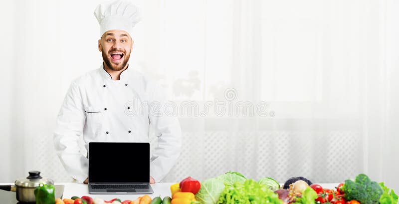 Male Chef Showing Laptop Computer Screen Standing in Kitchen, Mockup ...