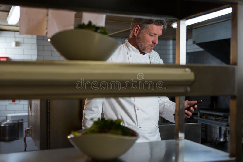 Male Chef Using Mobile Phone Stock Image - Image of professional ...