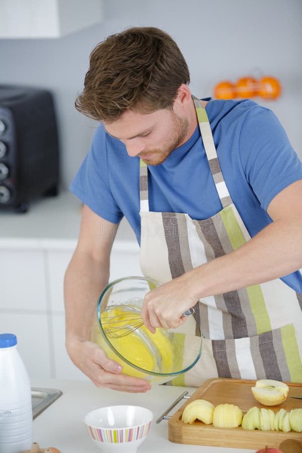 Man Holding Whisk Like a Gun Stock Image - Image of years, brown: 21257625