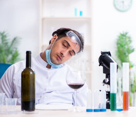 Male Chemist Examining Wine Samples at Lab Stock Photo - Image of chemistry, laboratory: 272129686