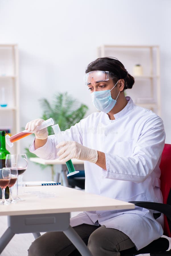 Male Chemist Examining Wine Samples at Lab Stock Image - Image of ...