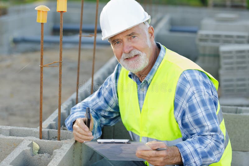 Male Civil Engineer Checking Projects on Construction Site Stock Photo ...