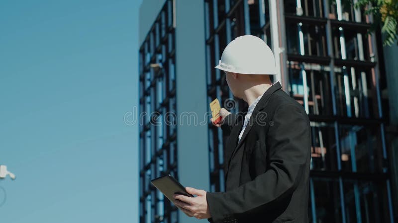 Male Civil Engineer Contractor in Safety Helmet and Jacket Standing on ...