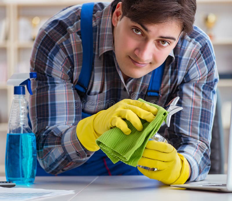 Male Cleaner Working in the Office Stock Photo - Image of equipment ...