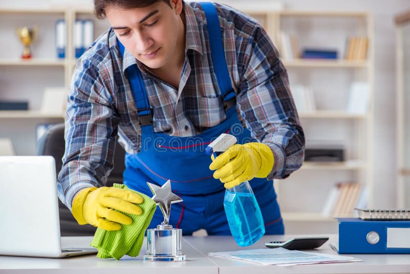 The Male Cleaner Working in the Office Stock Image - Image of ...